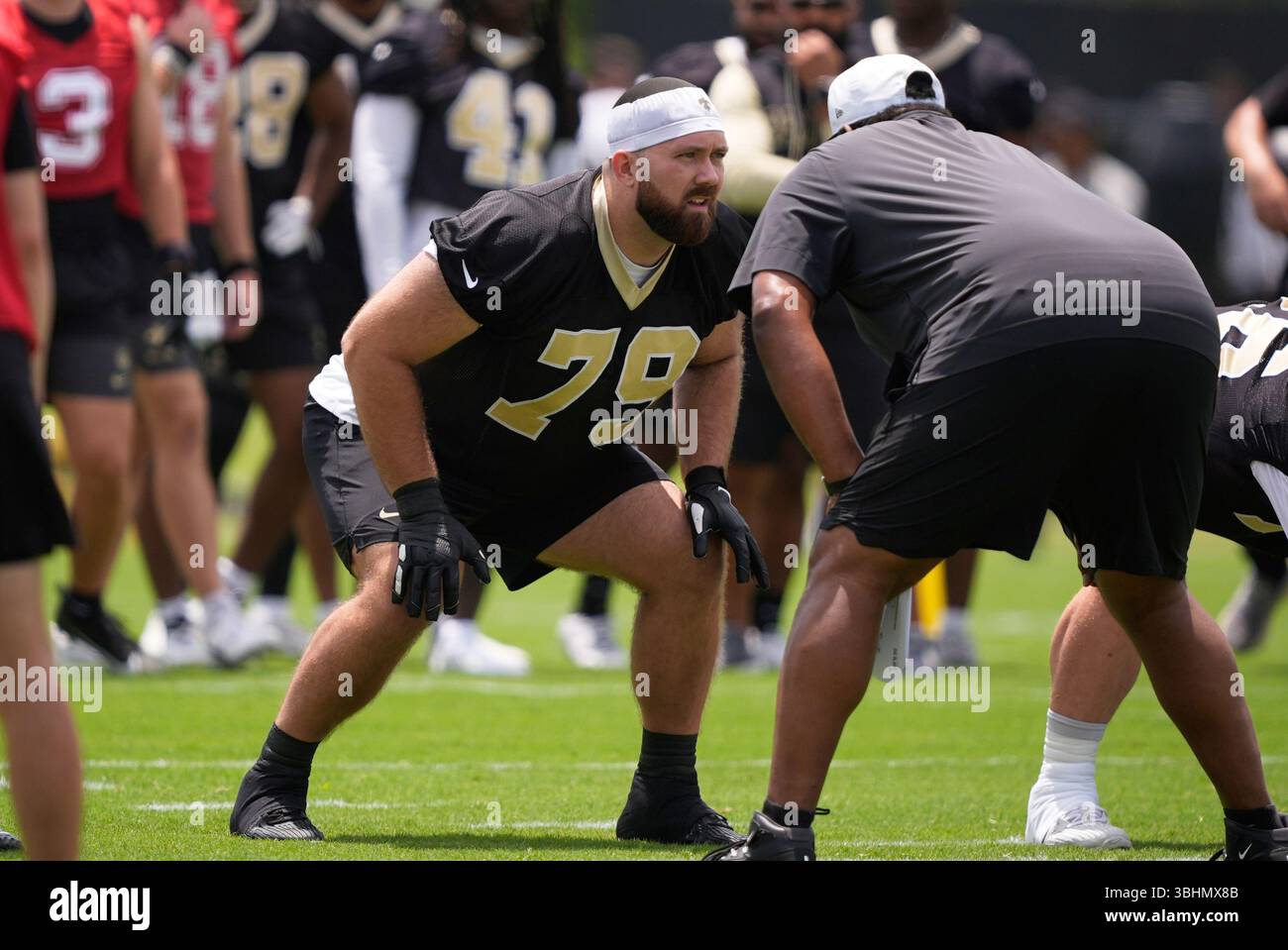 New Orleans Saints offensive tackle Josh Ball (79) runs through drills ...