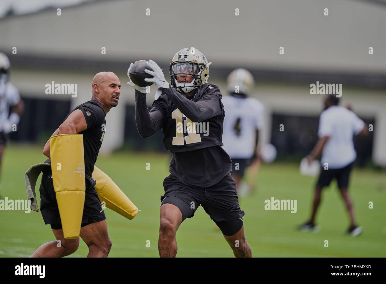 New Orleans Saints wide receiver Cedrick Wilson Jr. (11) goes through ...