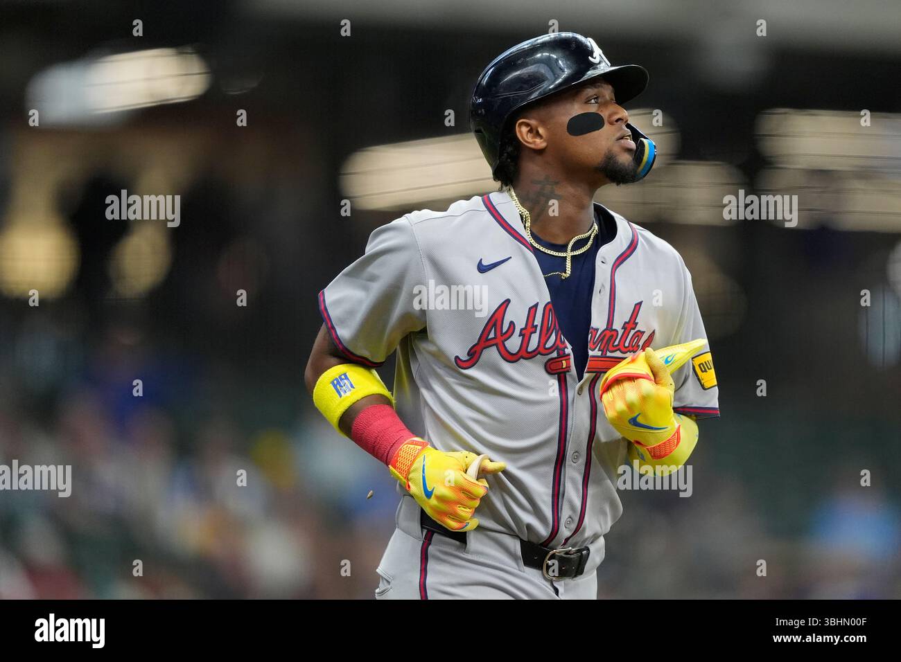 Atlanta Braves' Ronald Acuña Jr. jogs to first base during a baseball ...