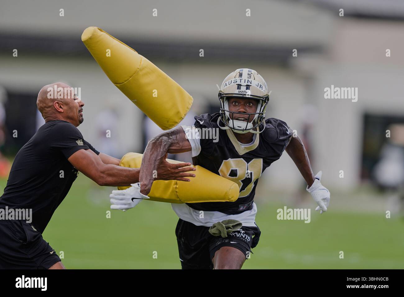 New Orleans Saints wide receiver Kevin Austin Jr. (81) goes through ...