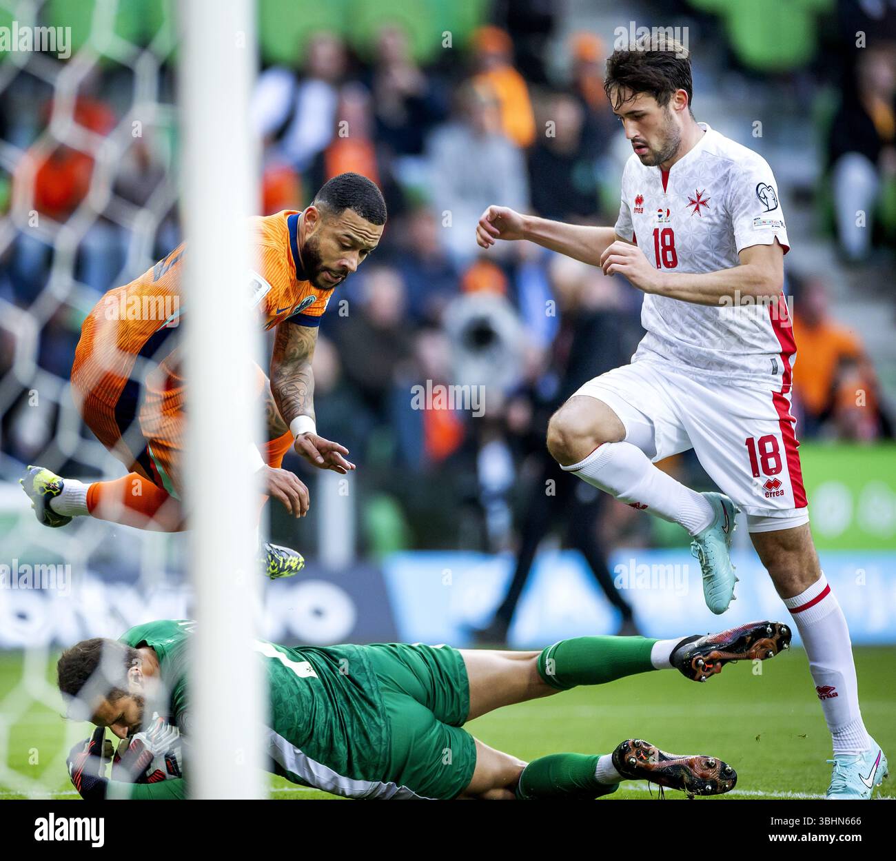 GRONINGEN - (l-r) Malta goalkeeper Henry Bonello, Memphis Depay of the ...