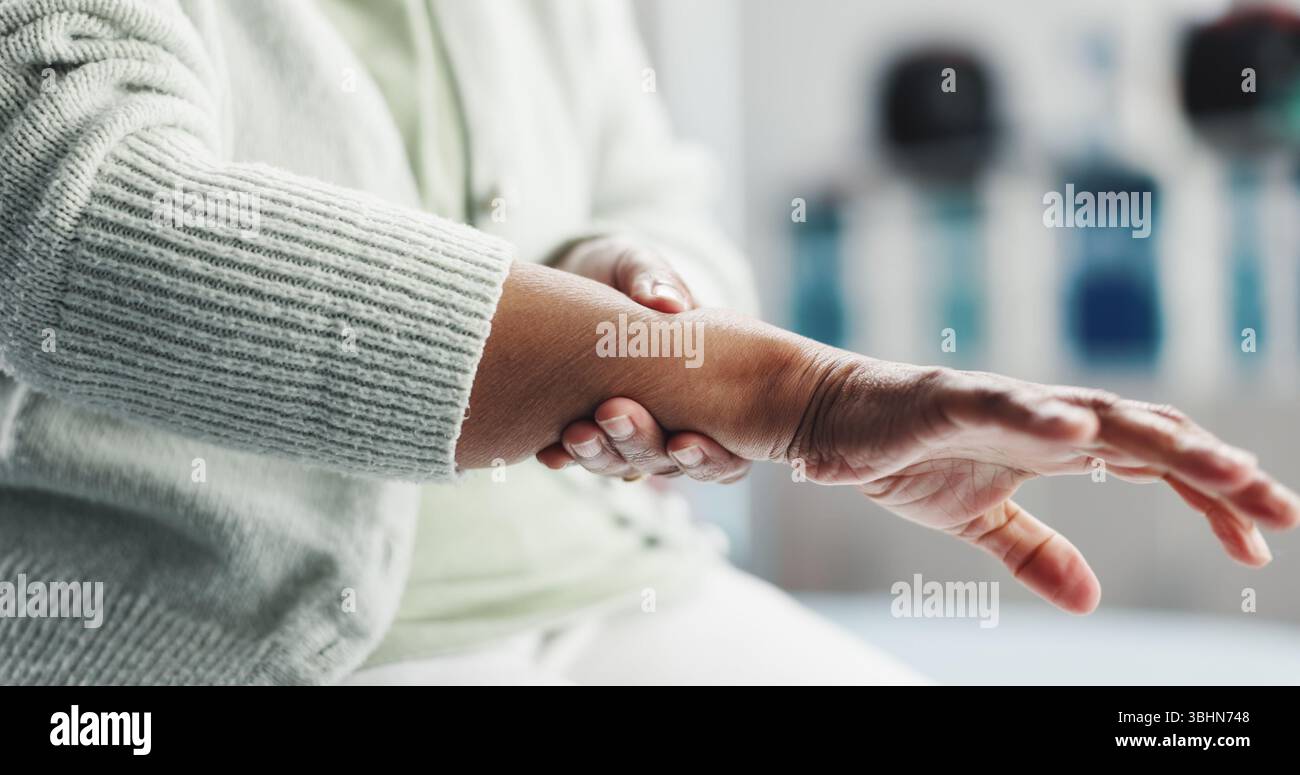 Wrist pain, massage and injury with hands of old woman for fibromyalgia ...