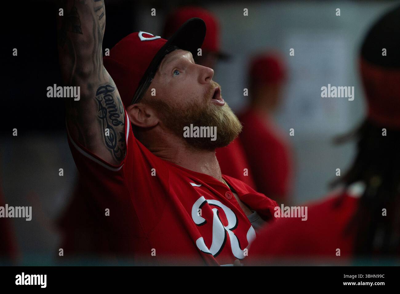 Cincinnati Reds' Jake Fraley jokes around in the dugout before the ...