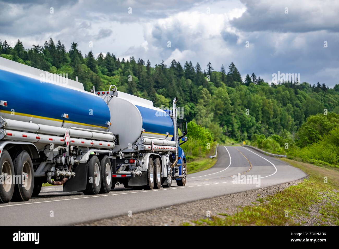 Powerful Industrial hauler big rig blue day cab semi truck tractor ...