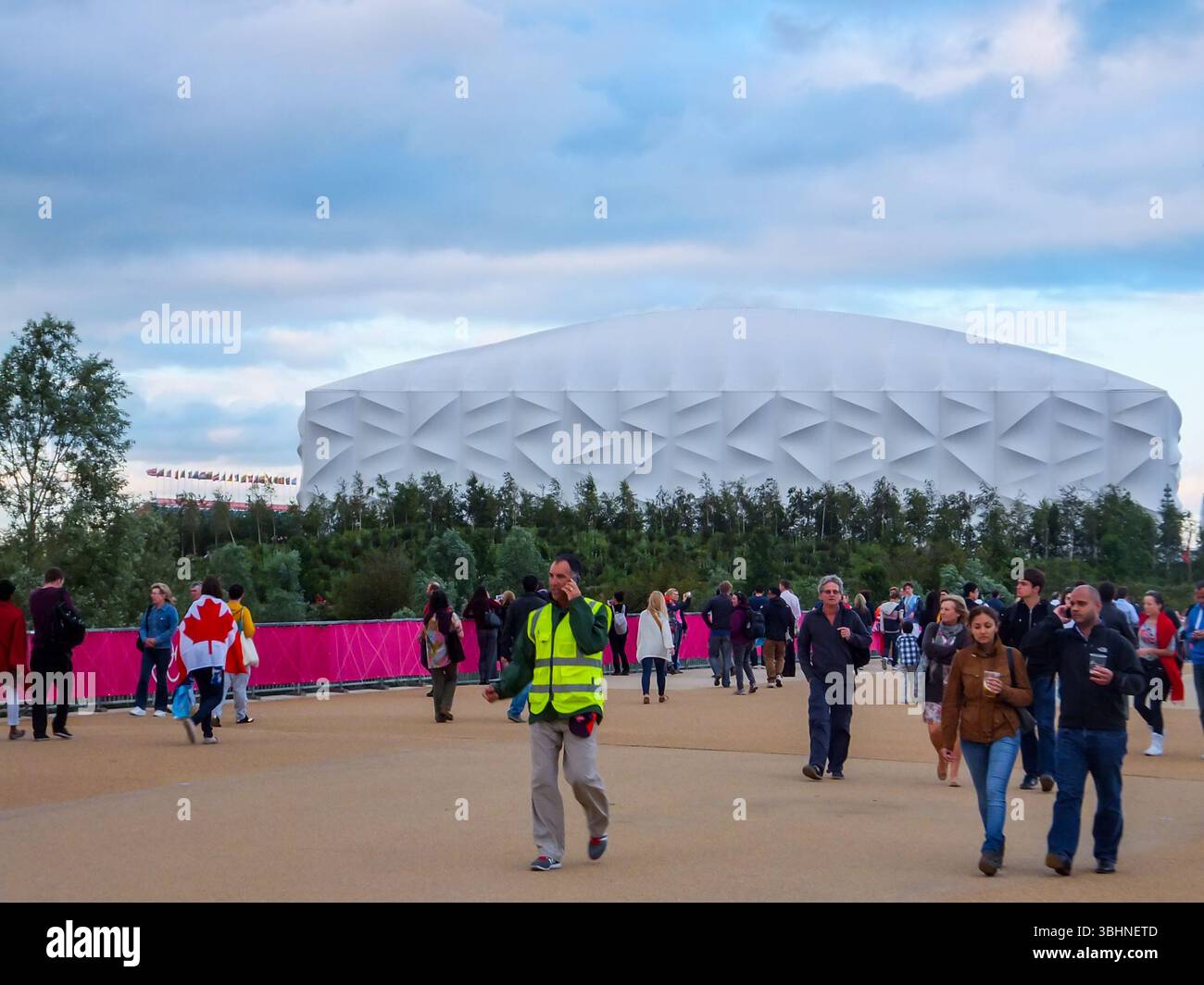 People outside the Basketball Arena under a cloudy sky during the 2012 ...