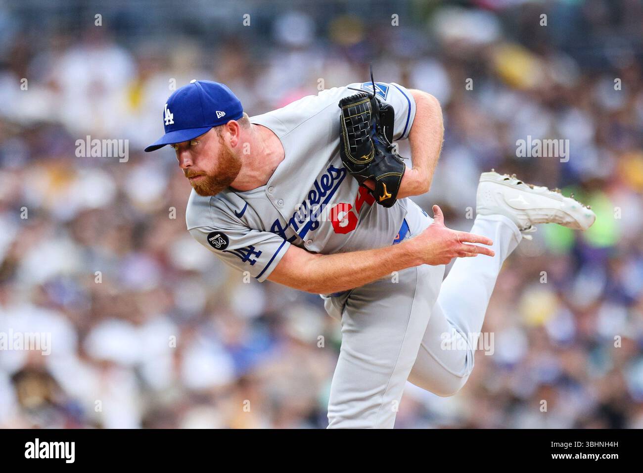 Los Angeles Dodgers' Matt Sauer follows through on a pitch against the ...