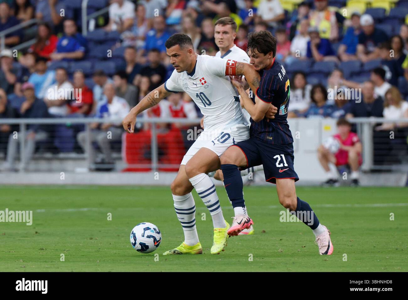 NASHVILLE, TN - JUNE 10: Switzerland midfielder Granit Xhaka #10 fights ...