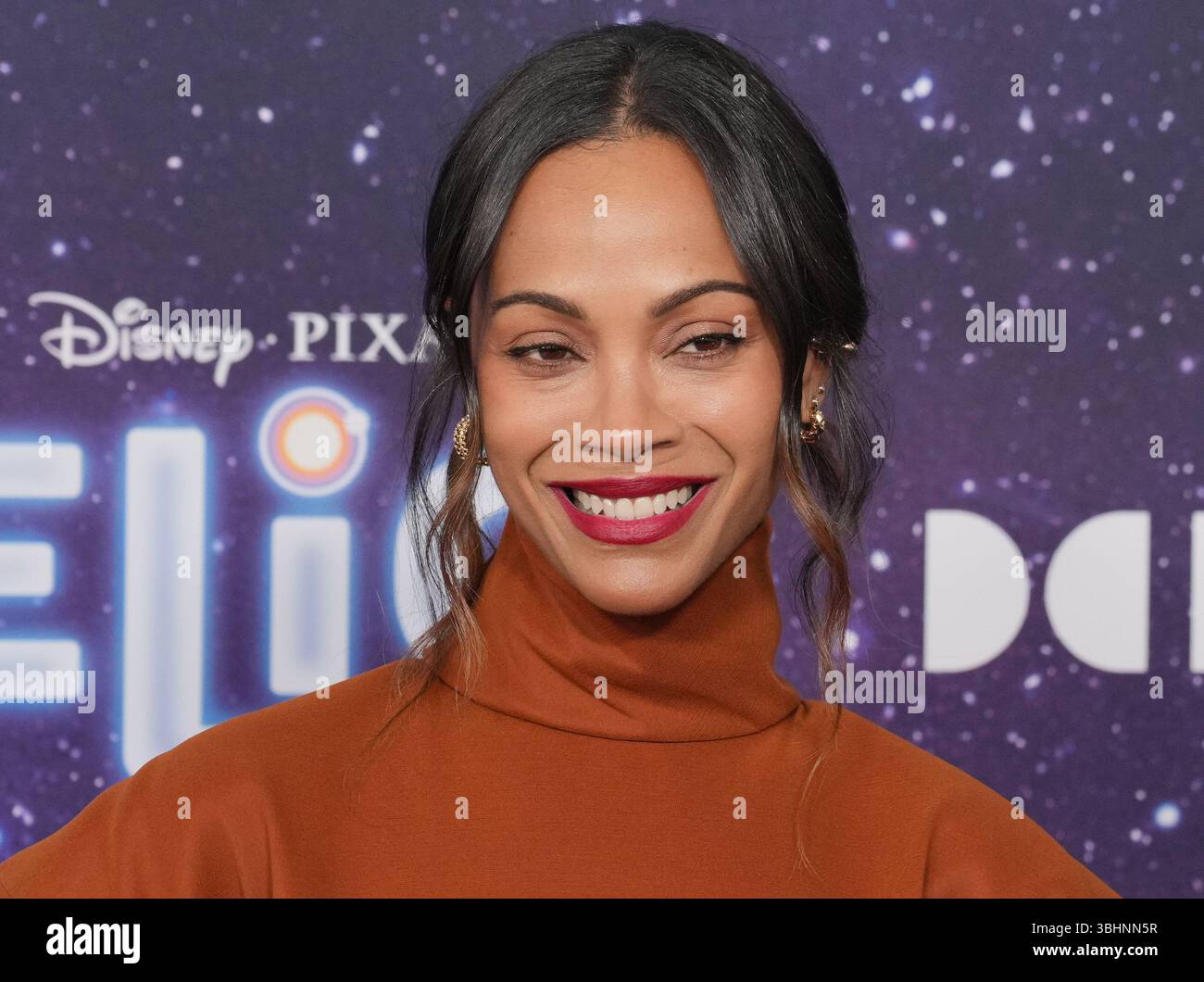 Zoe Saldaña arrives at the Disney Pixar's ELIO World Premiere held at ...