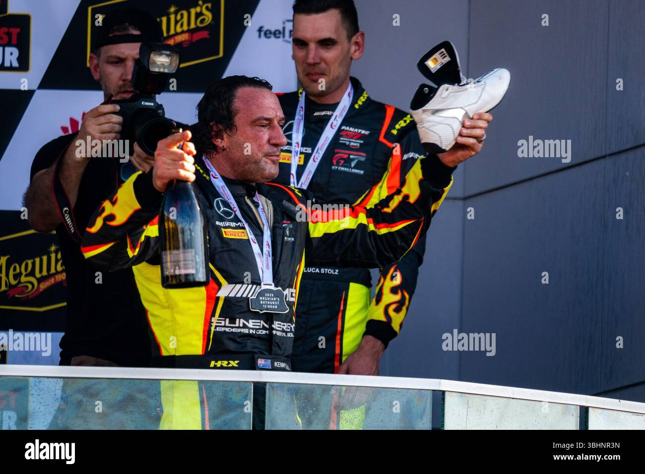 The SunEnergy1 Racing’s KENNY HABUL performing a “shoey” at the Meguiar ...
