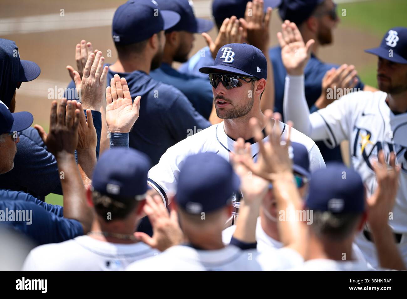 Tampa Bay Rays outfielder Josh Lowe, center, celebrates with teammates ...