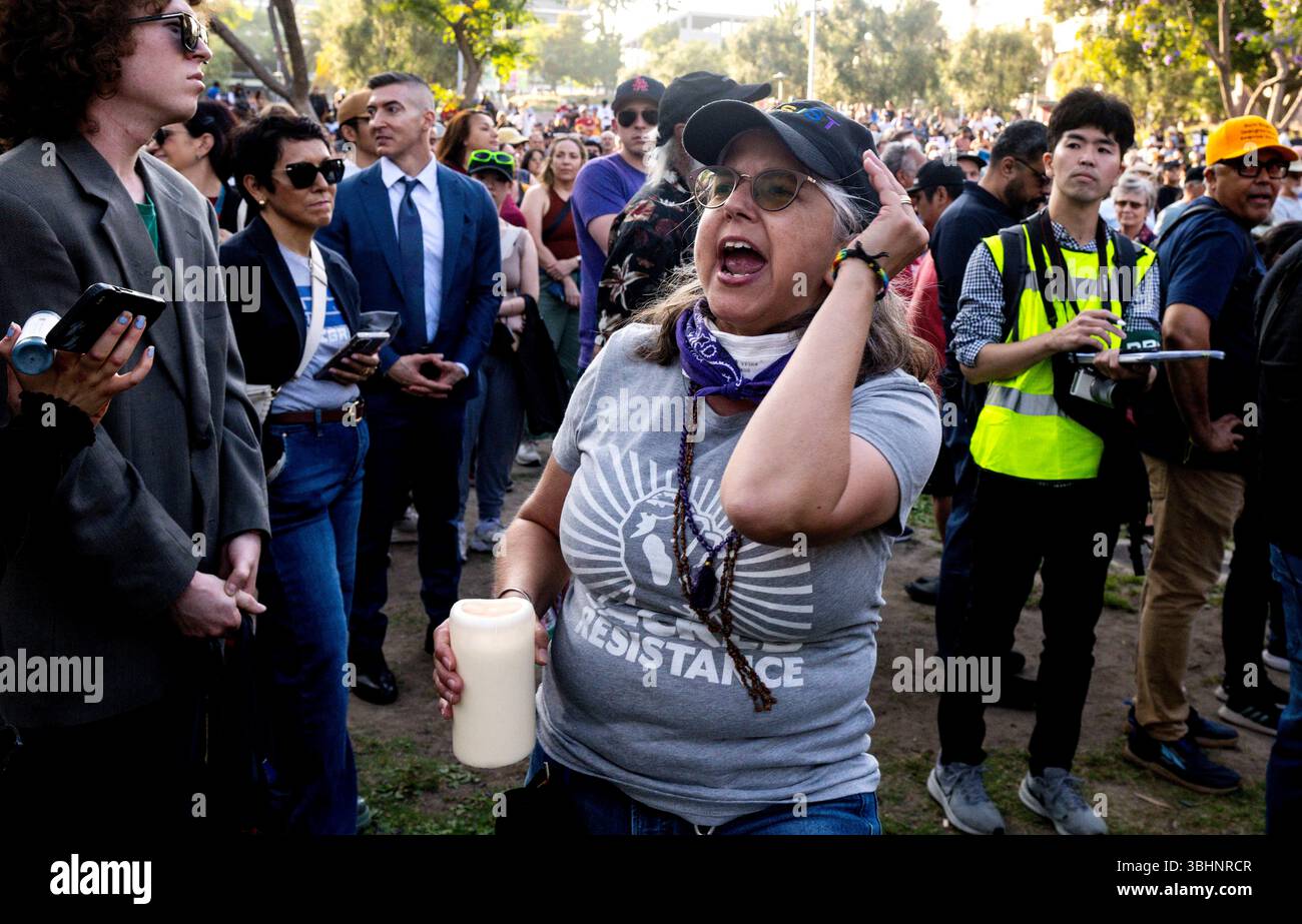 June 10, 2025 - Los Angeles, California, USA -A woman expresses her displeasure in the direction ...