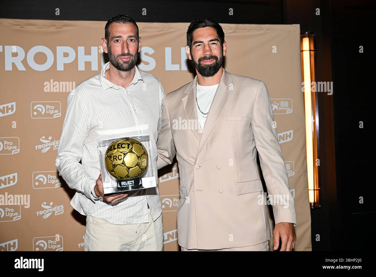 Nikola Karabatic and Raphael Caucheteux during a ceremony for the LNH ...