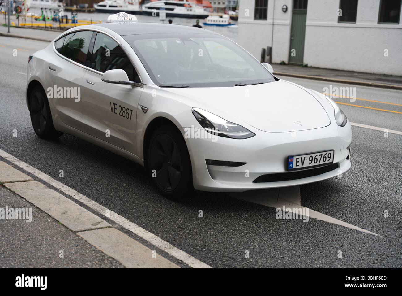 Bergen, Norway - July 10, 2024: White Tesla Model 3 electric taxi Stock ...