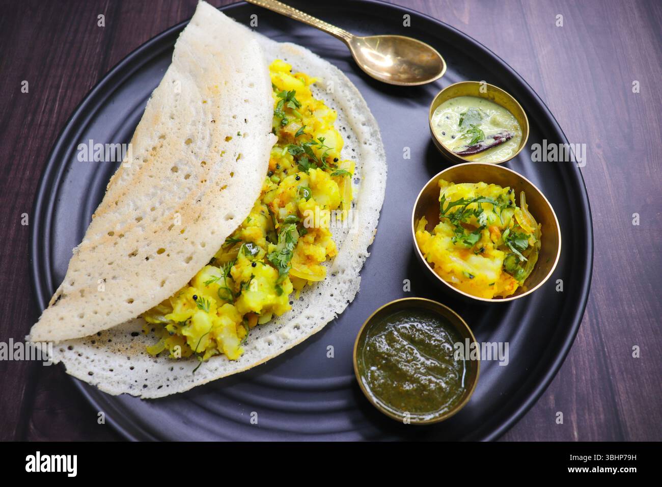 Crispy Masala dosa is a popular South Indian food item served with ...
