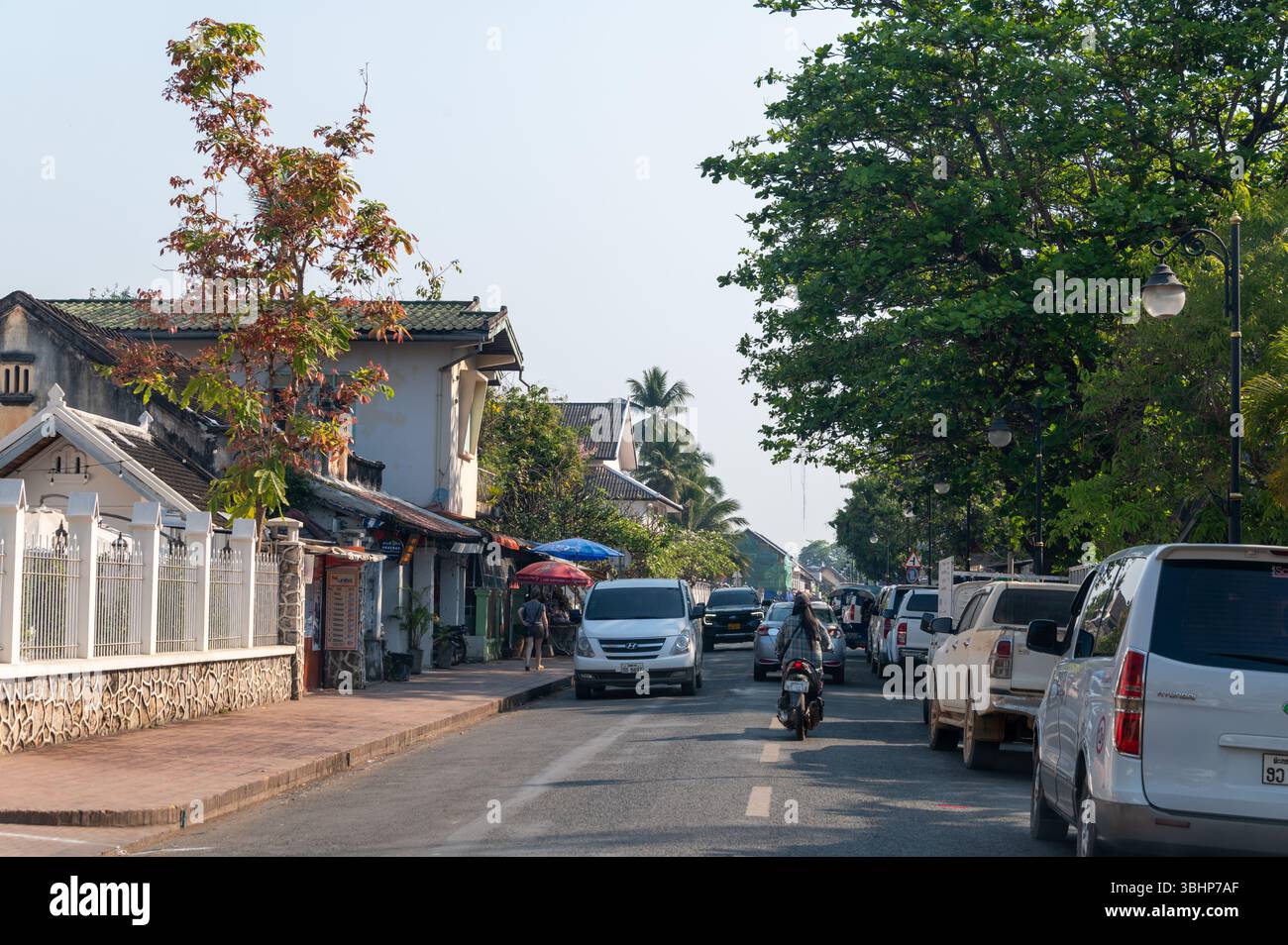 Traffic along Chaofa Ngum Road ( Main Street in Luang Prabang, northern ...