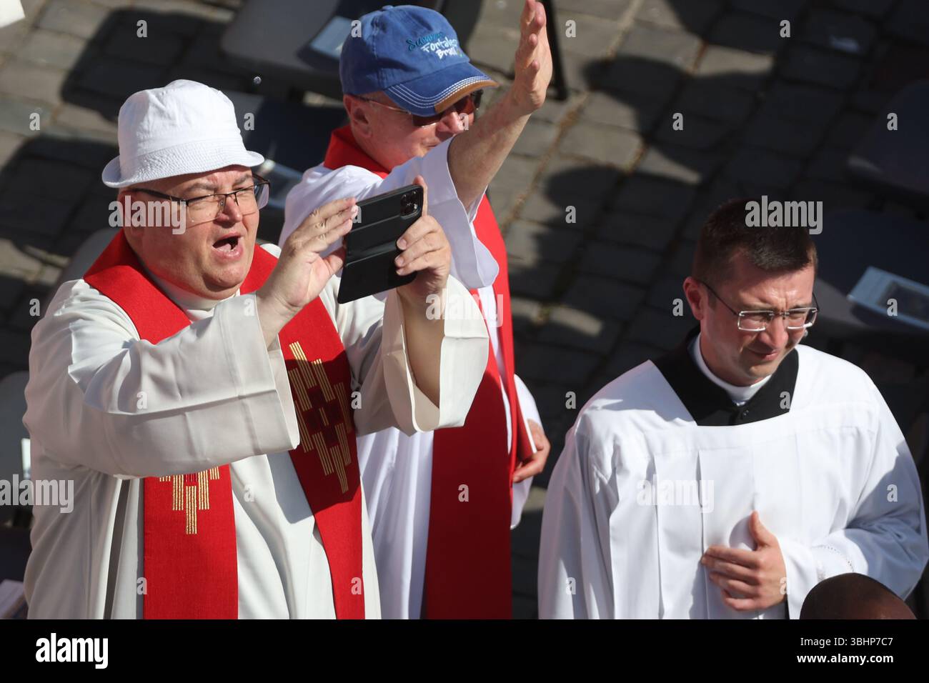 Vatican City, Italy June 8, 2025: Priests take pictures of the Pope ...