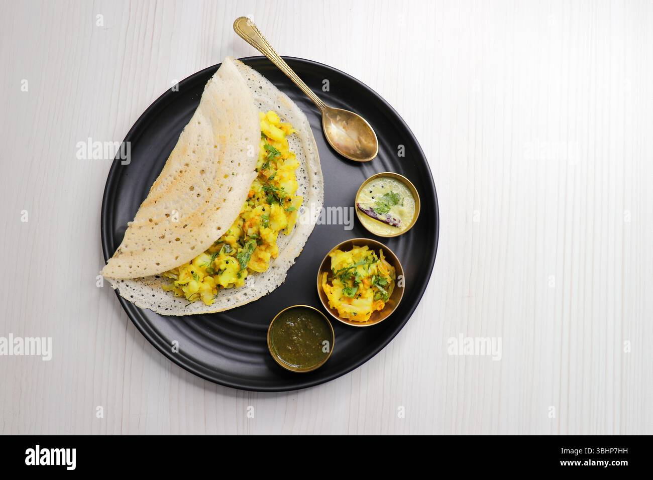 Crispy Masala dosa is a popular South Indian food item served with ...