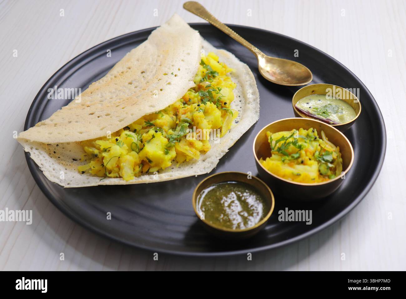 Crispy Masala dosa is a popular South Indian food item served with ...