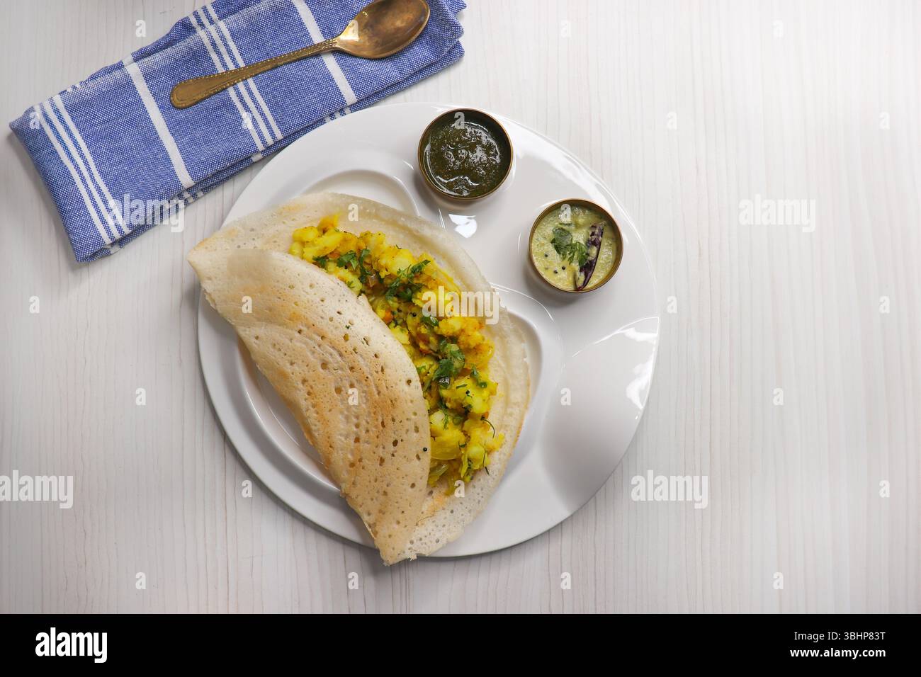 Crispy Masala dosa is a popular South Indian food item served with ...