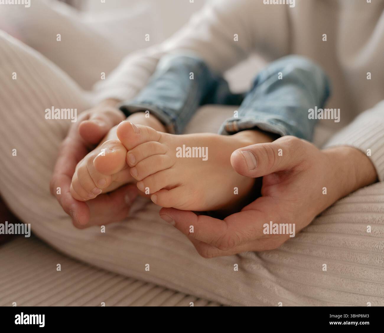 Tickling boy feet hi-res stock photography and images - Alamy