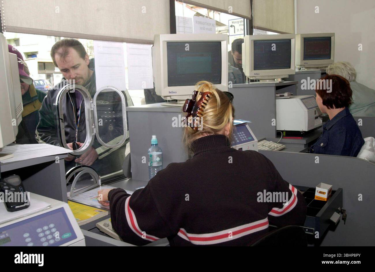 female cashier working at the cash desk in a store female cashier at ...