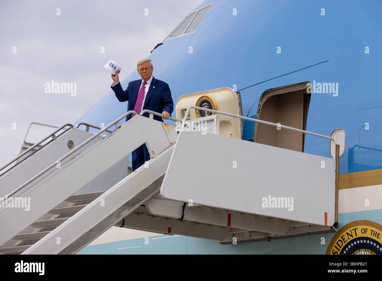 President Donald J. Trump exits a Boeing 757 at Pope Army Airfield ...