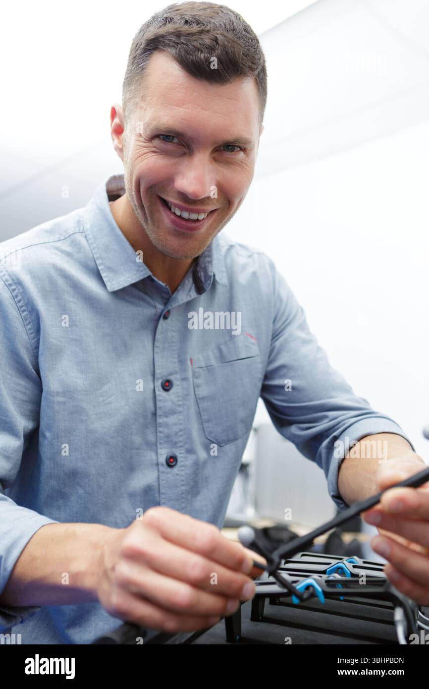 Man fixing ink jet hi-res stock photography and images - Alamy