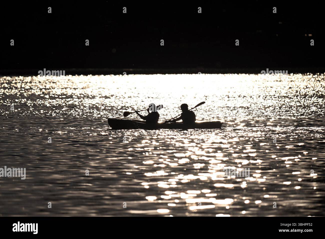 Tourists experience kayaking on the river in Shenyang City, northeast ...