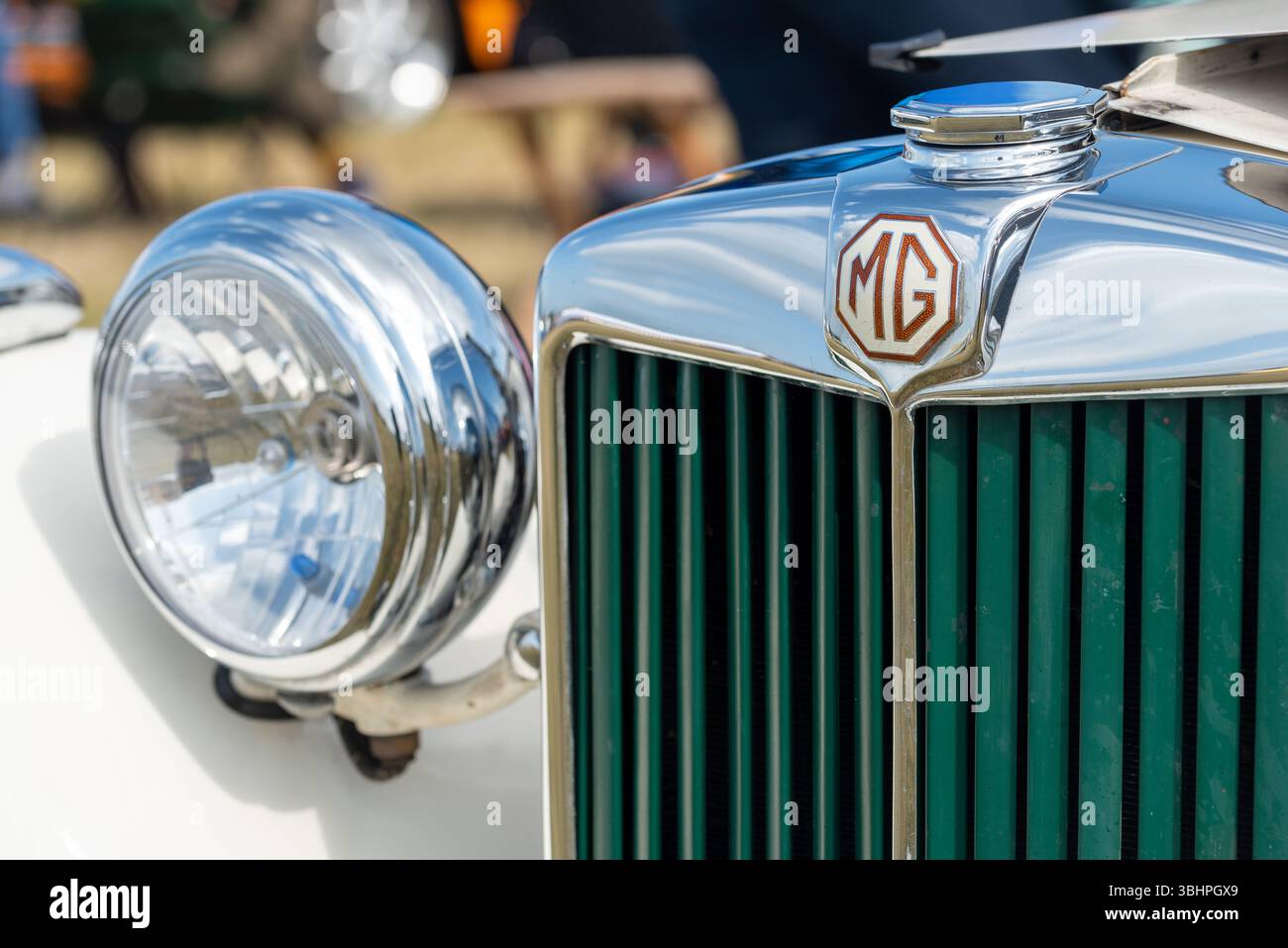 Headlight, grill and logo on a vintage MG car. August 2024 Stock Photo ...