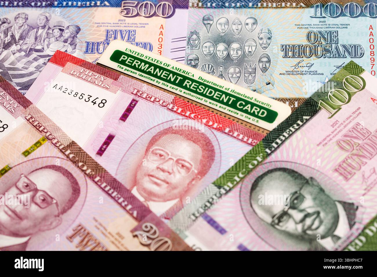 American Permanent Resident Card on Liberian money - dollar Stock Photo ...