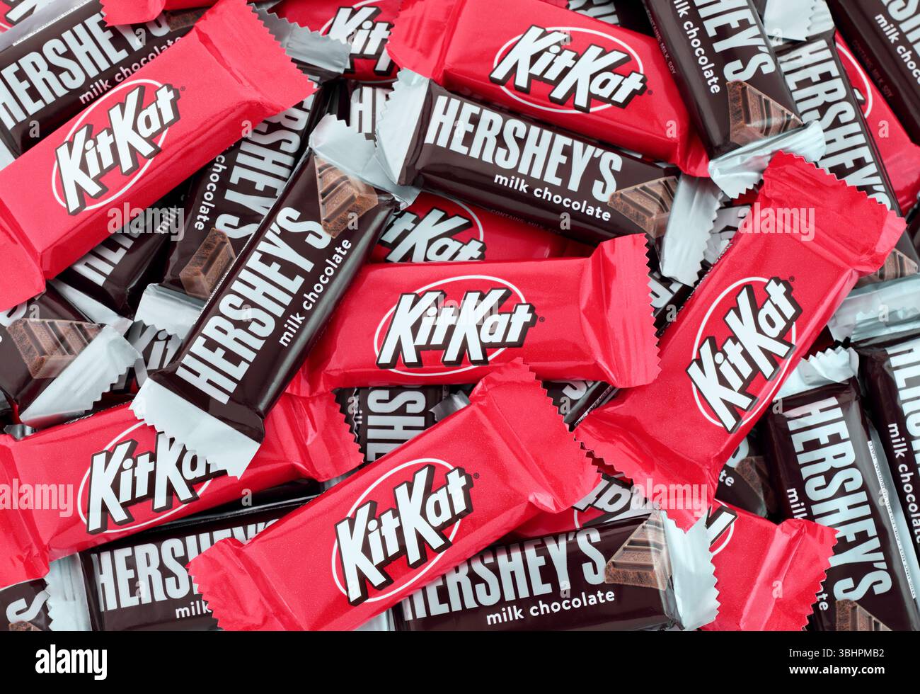 Background of a Chocolate bars mix in packages: Kit Kat and Hershey's ...