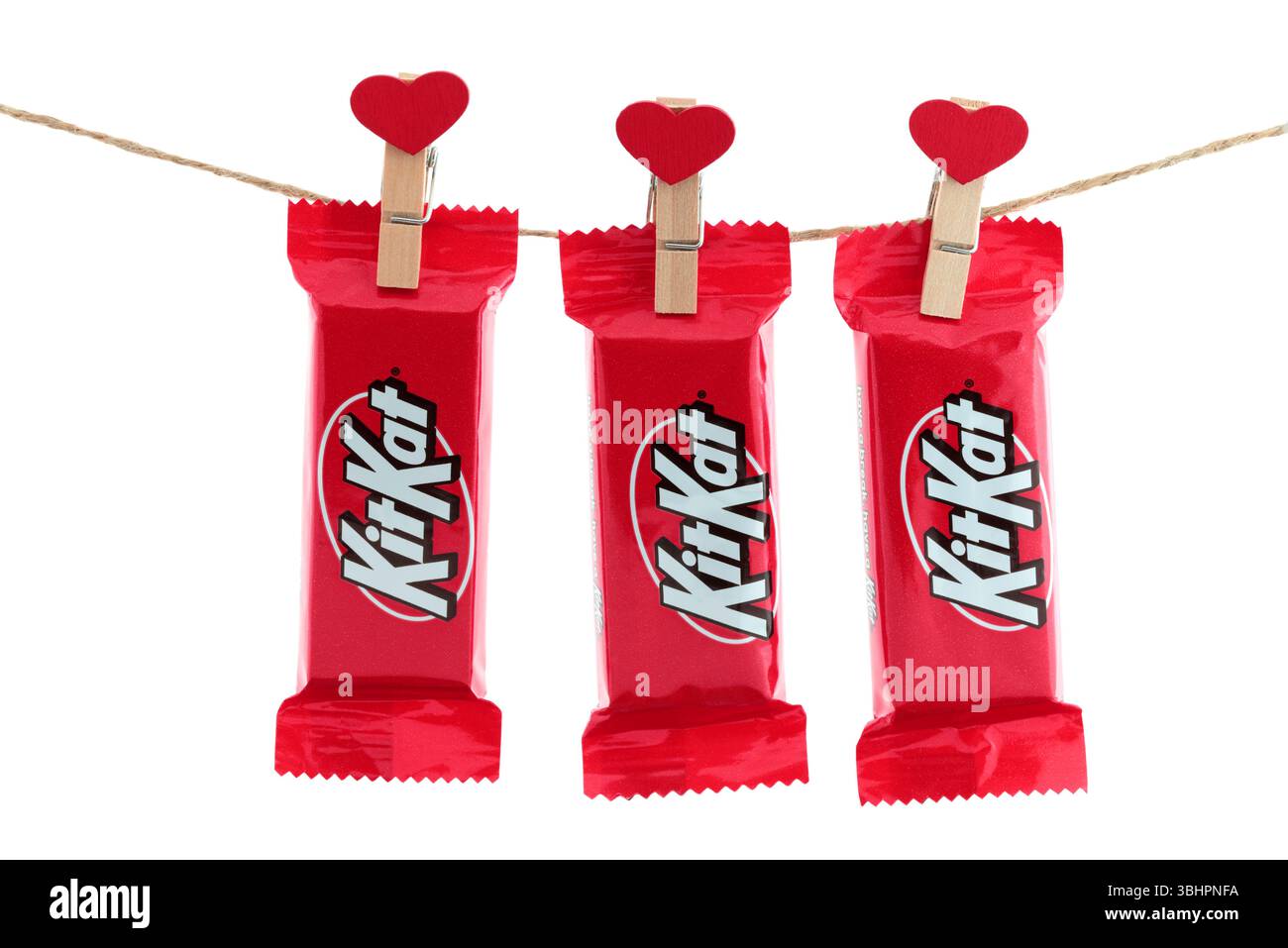 Chocolate bars Kit Kat hanging on a rope with red love heart clothespin ...