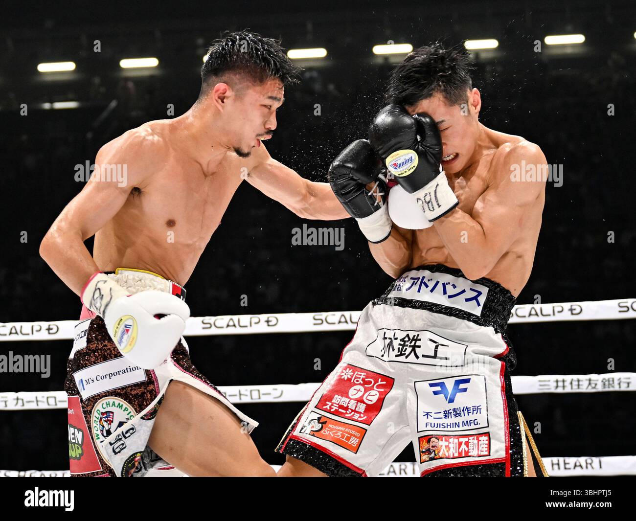 Junto Nakatani (white gloves) and Ryosuke Nishida (black globes ...