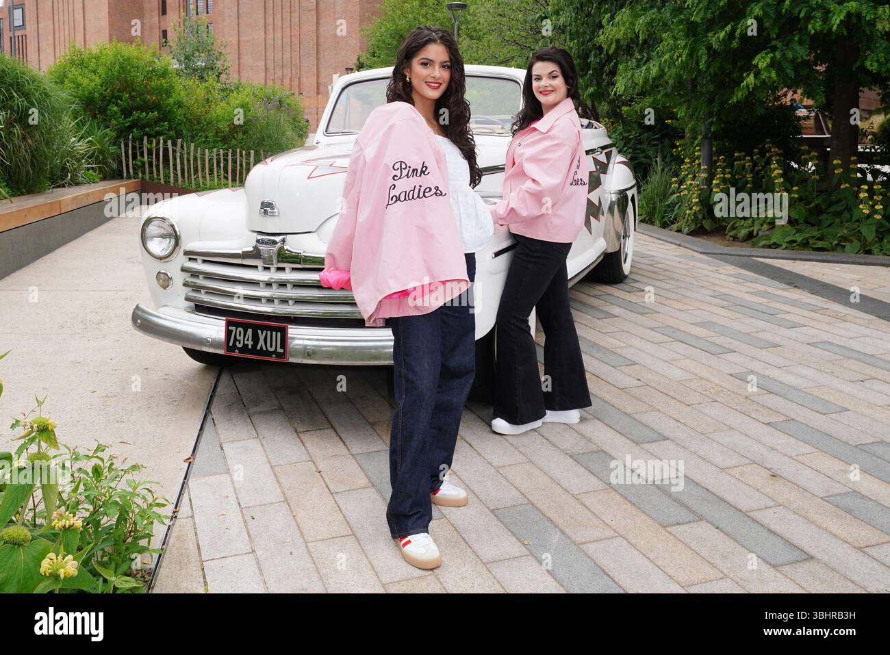 Stephanie Costi, who plays Sandy, (left) and Lucy Penrose, who plays ...