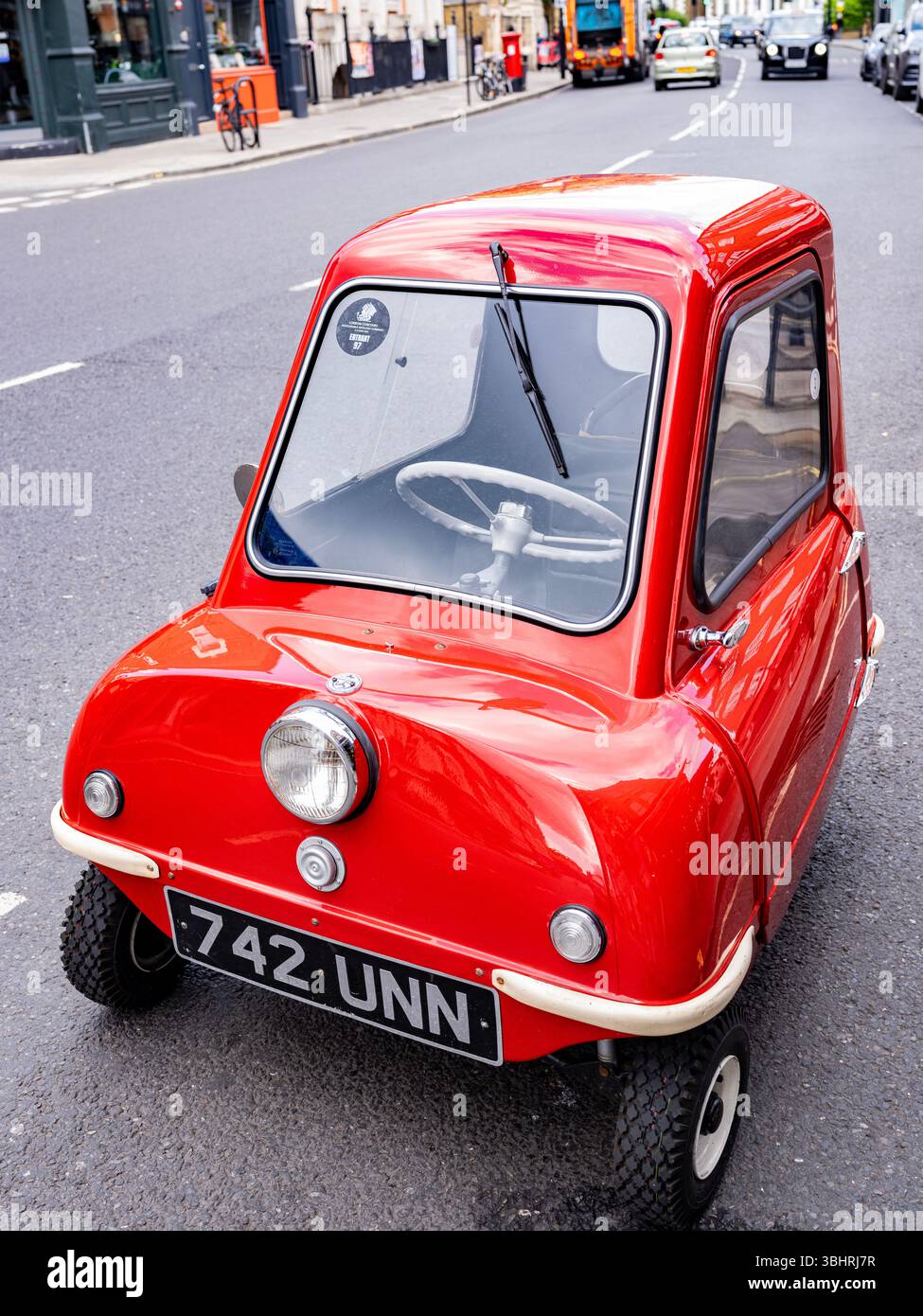 The Peel P50, a three-wheeled microcar, the smallest car in the world ...