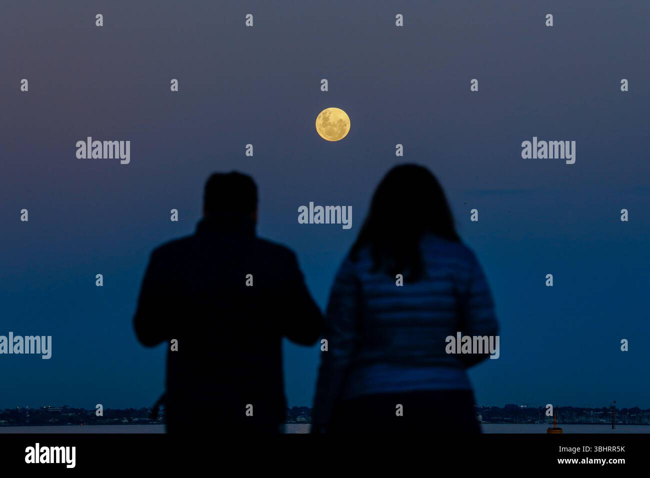 Melbourne, Australia. 11th June, 2025. A couple watches the strawberry ...