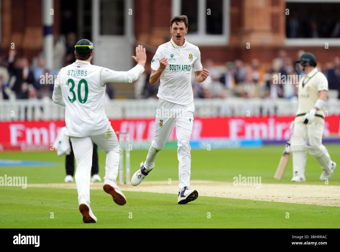 South Africa's Marco Jansen (right) celebrates the wicket of Australia ...