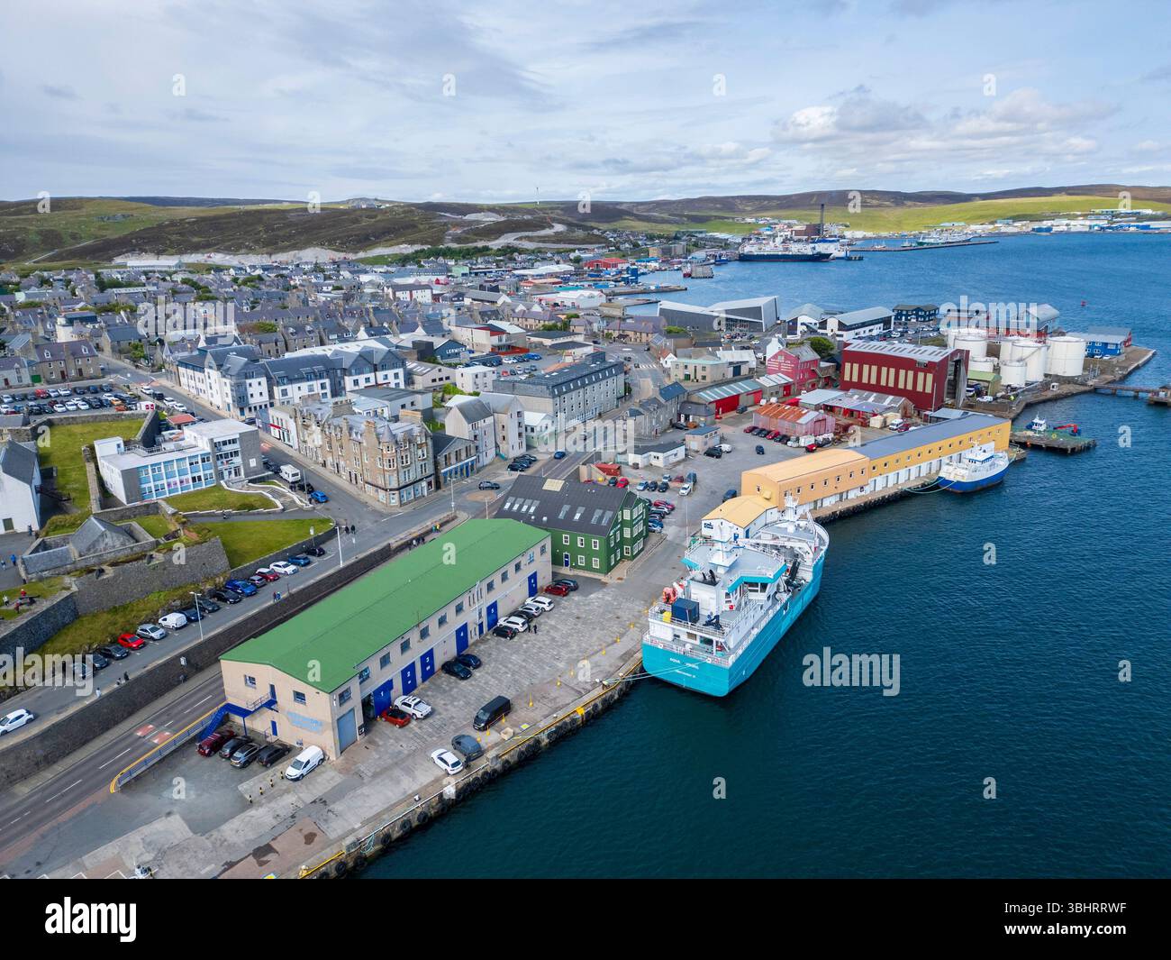 Aerial views over Lerwick, Shetland, on a bright summer day, showing ...