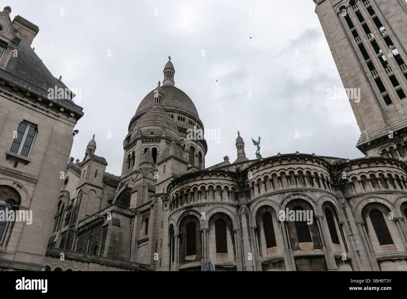 Paris, France - February 28, 2025: The Basilica of the Sacred Heart of ...