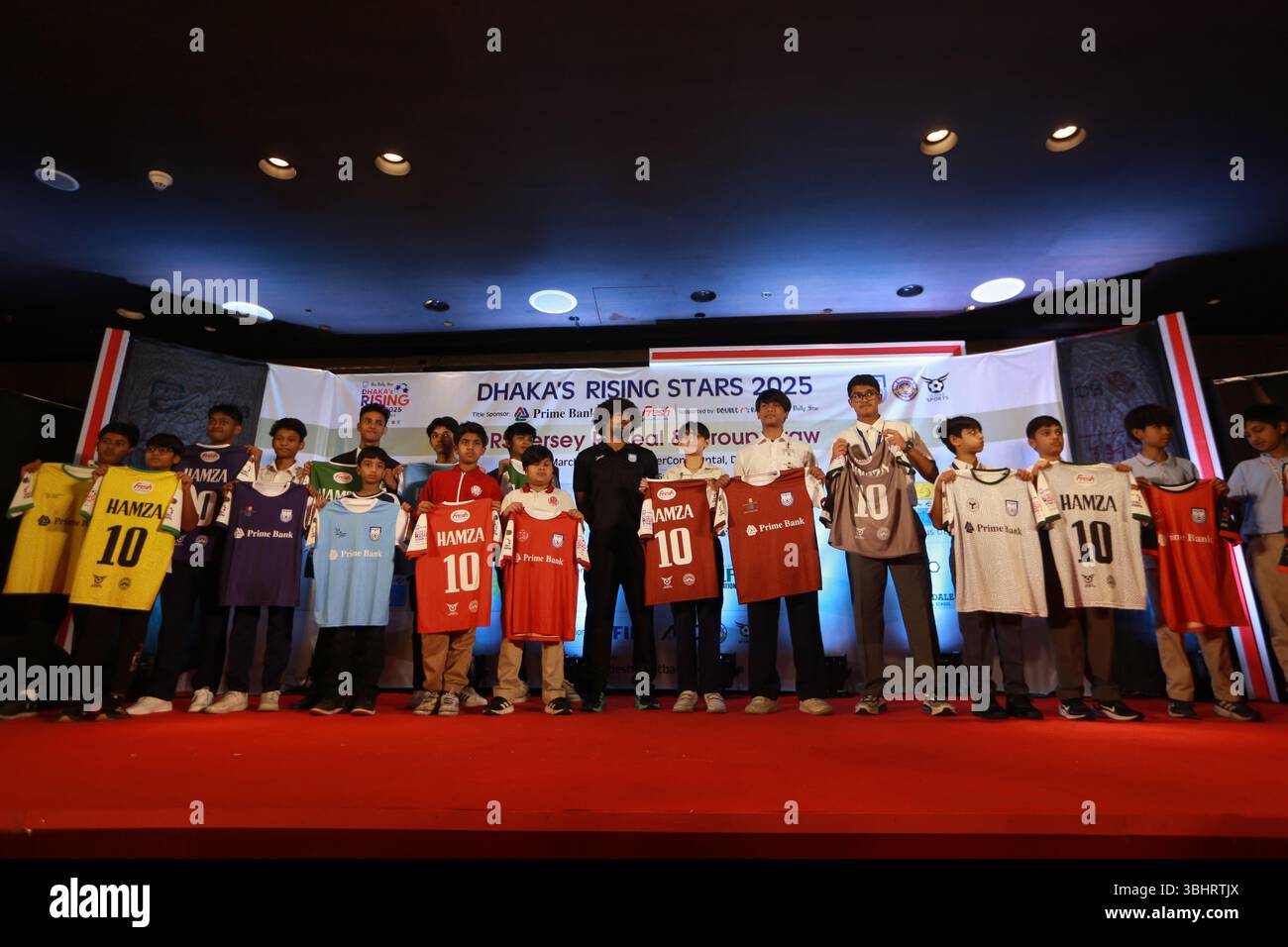 Hamza Choudhury (M) posed for photographs with school kids to promote ...
