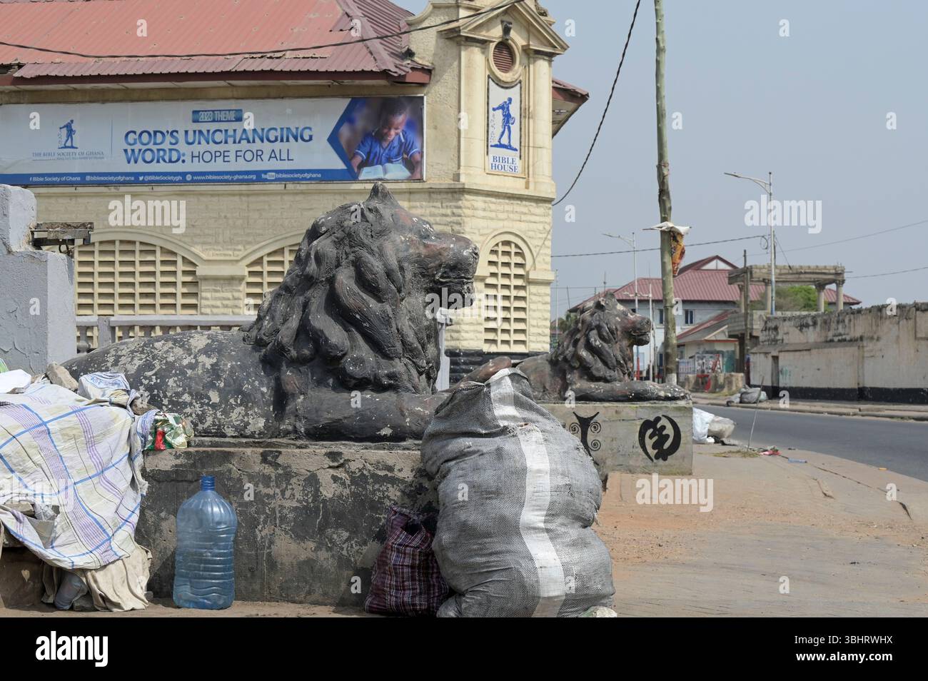 GHANA, Accra, Jamestown, lions sculpture at Mantse Palcae, old building ...