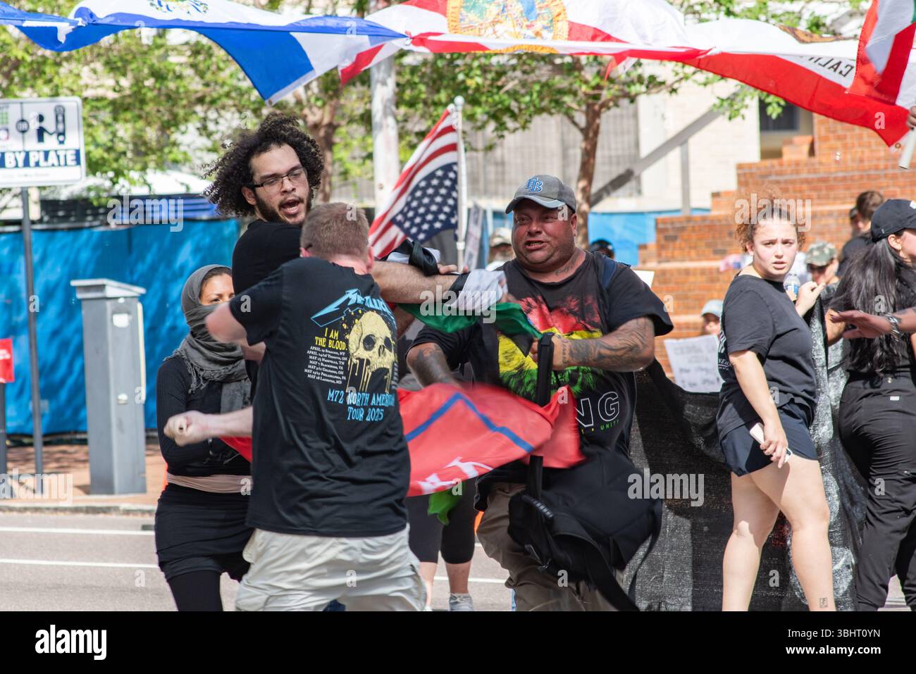 June 9, 2025: A protestor is seen attempting to break up a fight ...