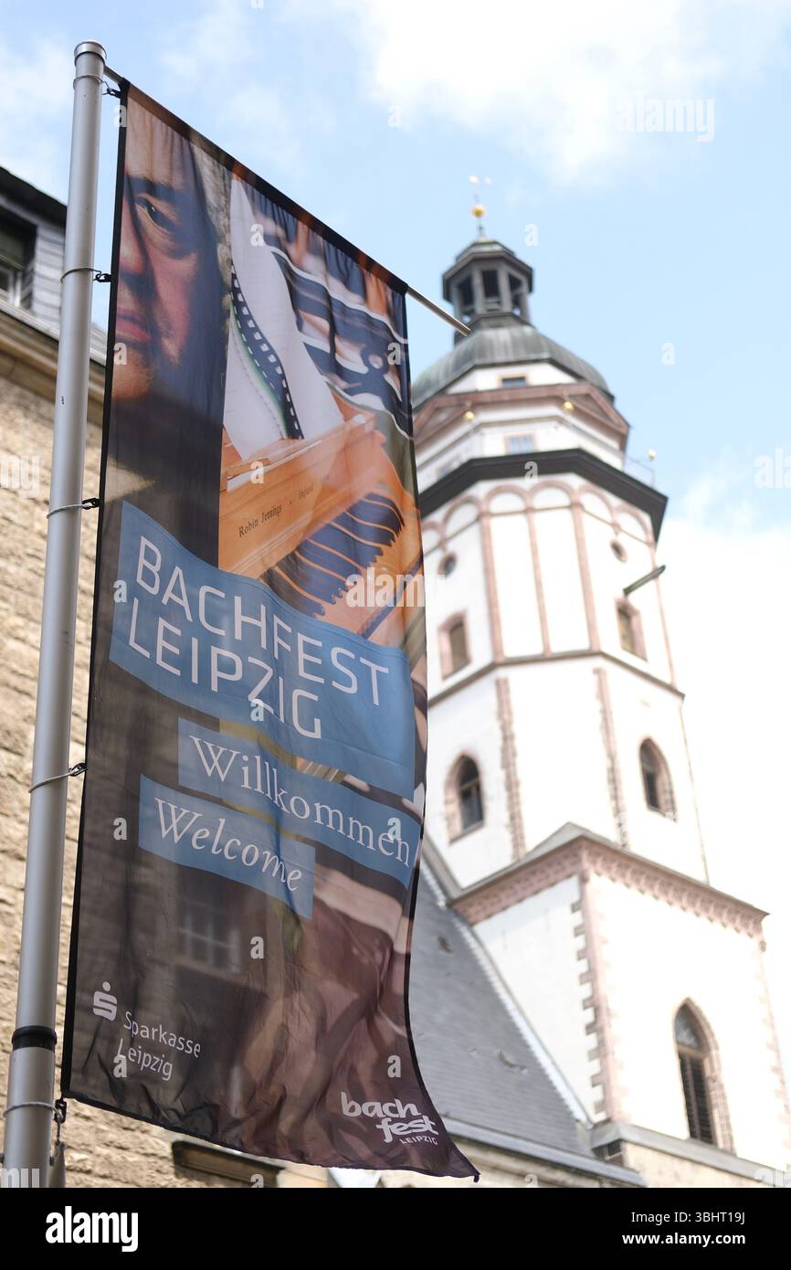 Leipzig, Germany. 11th June, 2025. Flags for the Bach Festival fly in ...