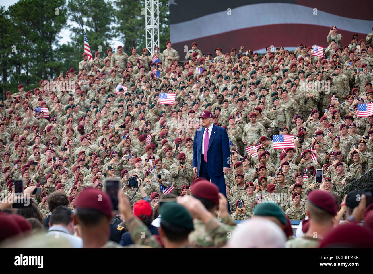 President Donald J. Trump poses for a photo in front of U.S. Army ...