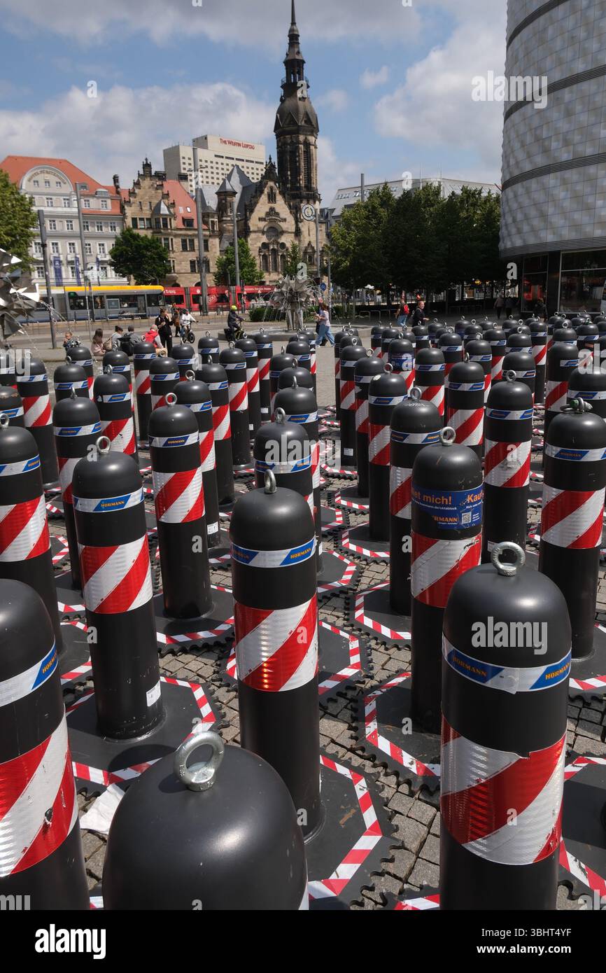 11 June 2025, Saxony, Leipzig: Mobile roadblocks in the city center ...