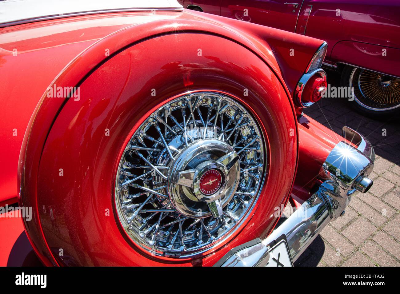 Chrome Wire Wheel of a Vintage Red 1955 Ford Thunderbird Stock Photo ...