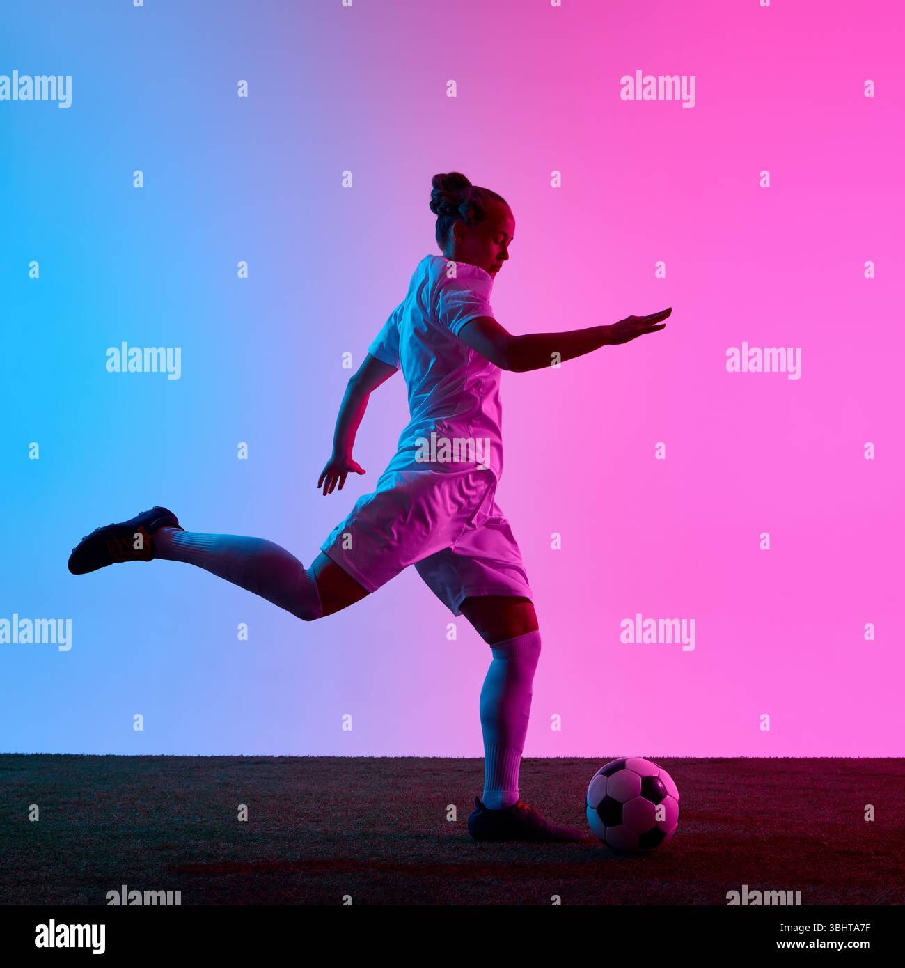 Female football player performing hi-res stock photography and images ...