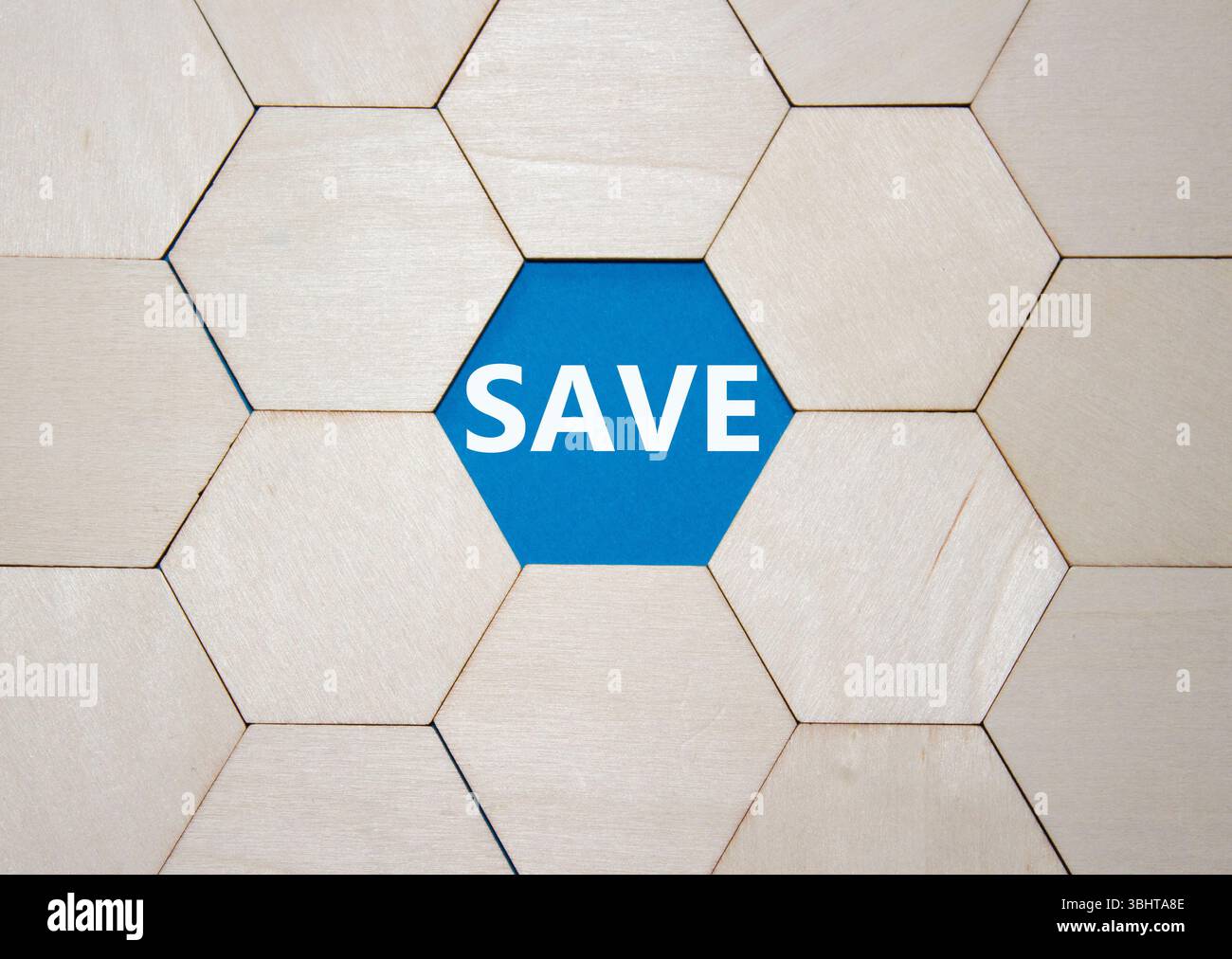 Save symbol. Concept word Save on wooden comb puzzle. Beautiful blue ...