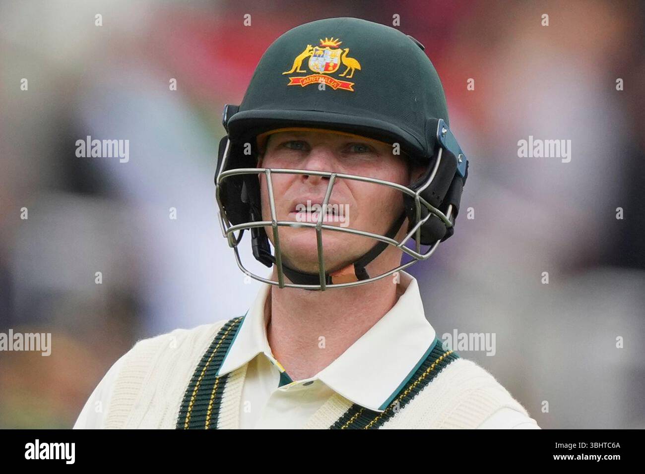 Australia's Steve Smith walks off the field after losing his wicket ...