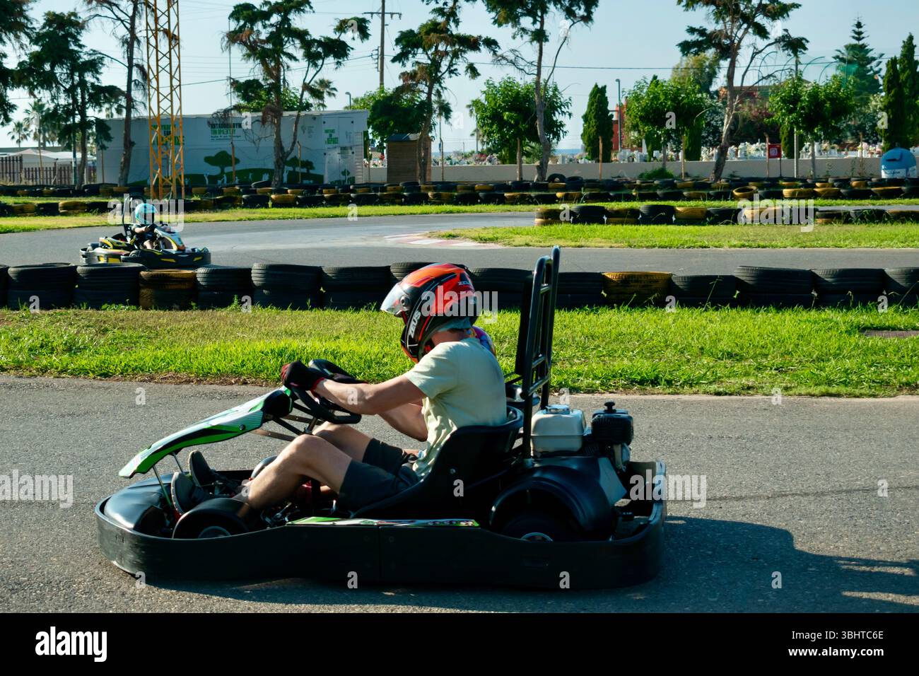 Malia, Crete, Greece. June 8, 2025. Kartland grand opening. Father with ...